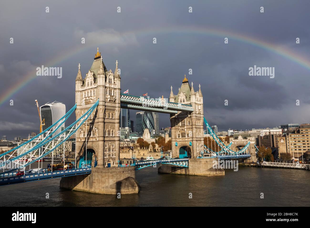 England, London, Rainbow over Tower Bridge and The City of London ...