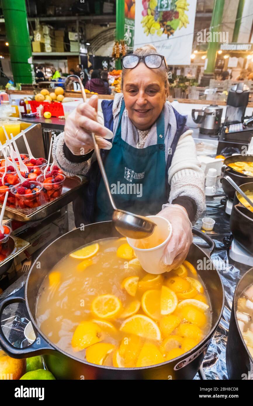 Lady selling mulled lemon juice hi-res stock photography and images - Alamy