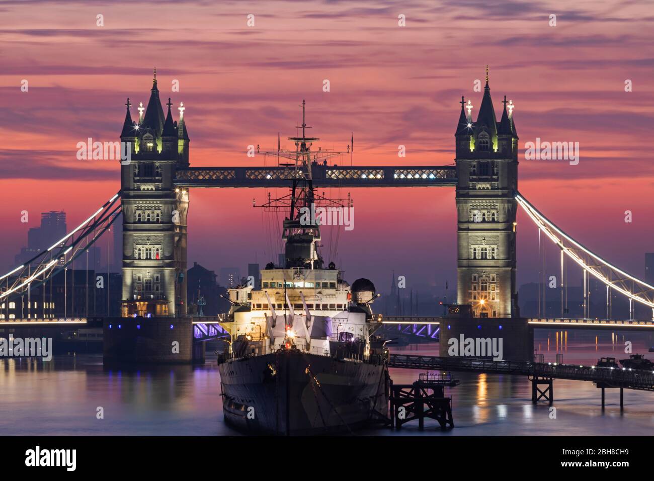 England, London, Tower Bridge and Museum Ship HMS Belfast at Dawn Stock ...