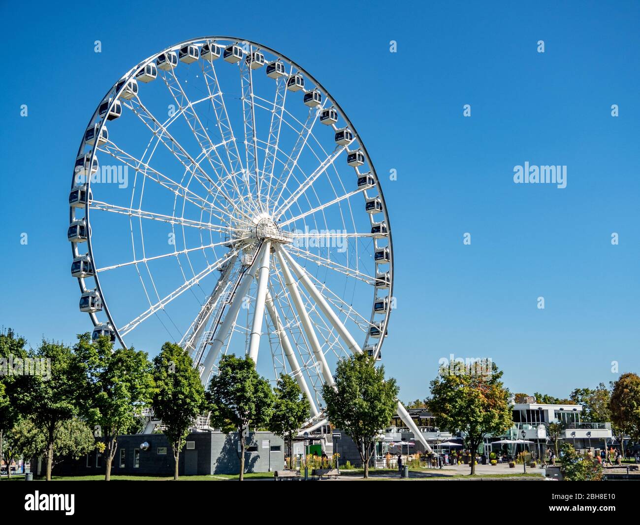 Giant ferris wheel with blue sky background and copy space Stock Photo ...