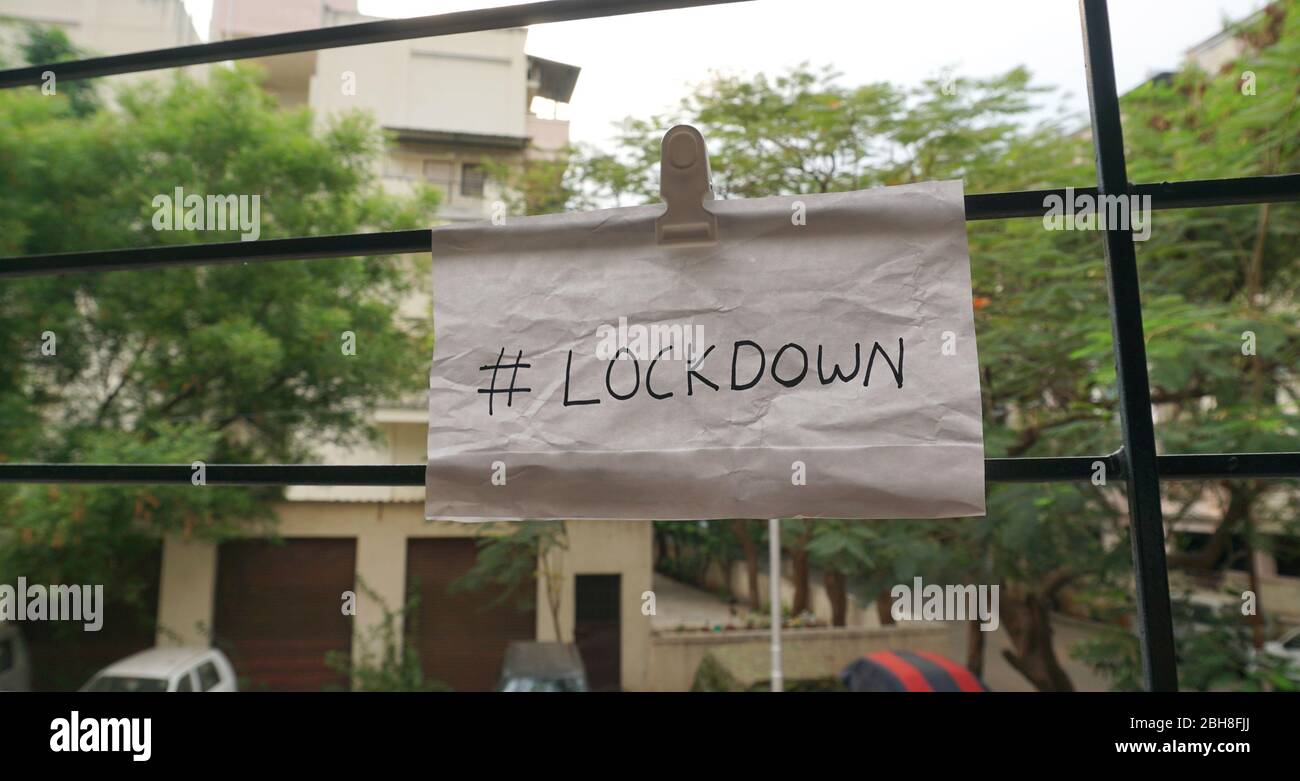 Lockdown sign on a window of building as a referral to the Coronavirus ...