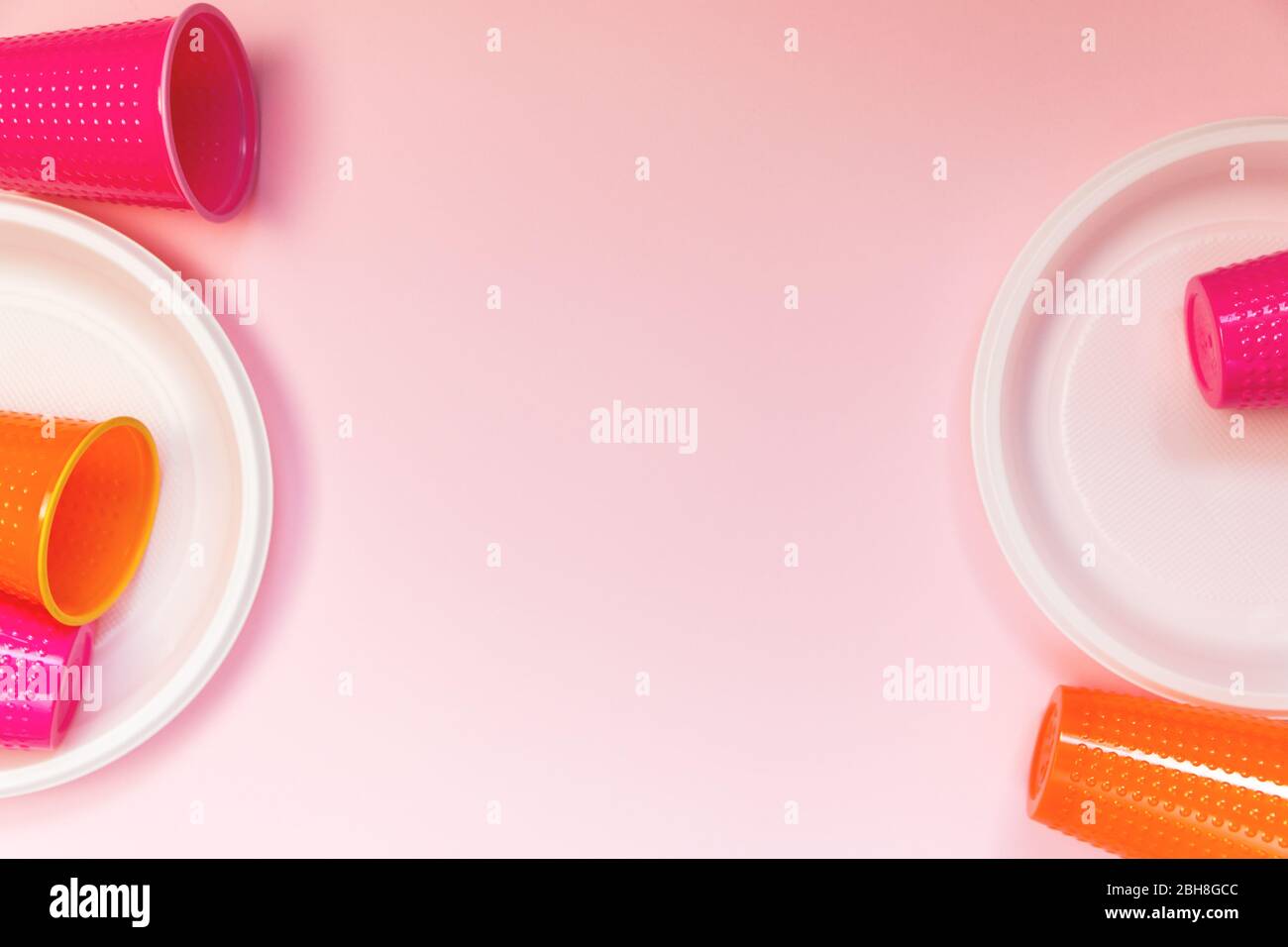 plastic waste on a pink background. Concept of plastic recycling and ...