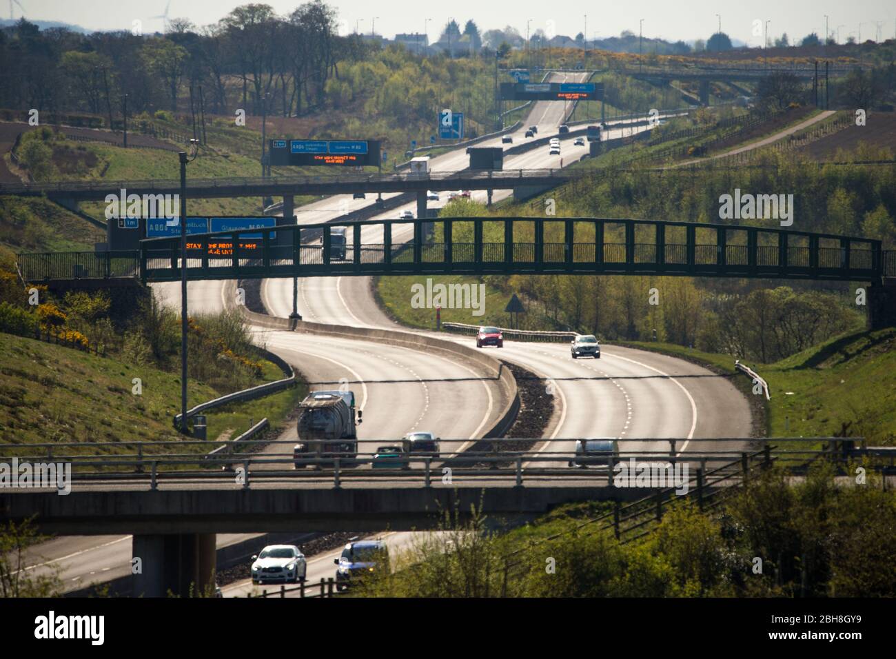 Compressed view of motorway with overhead bridges hi-res stock ...