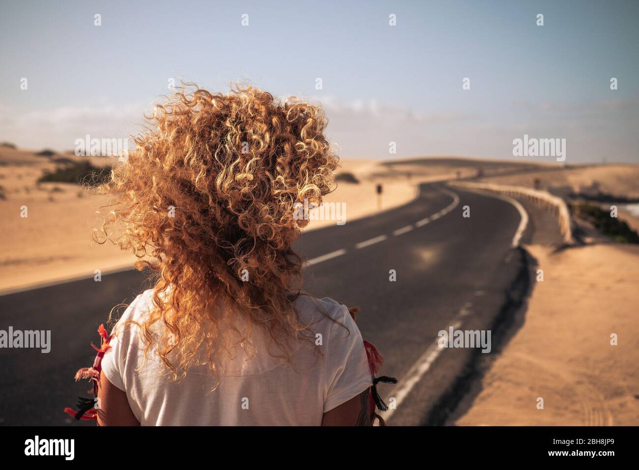 Curly hair in the wind hi-res stock photography and images - Alamy