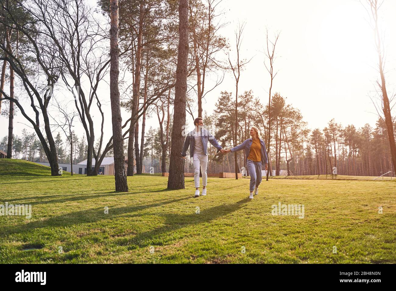 Two happy people smiling at each other Stock Photo - Alamy