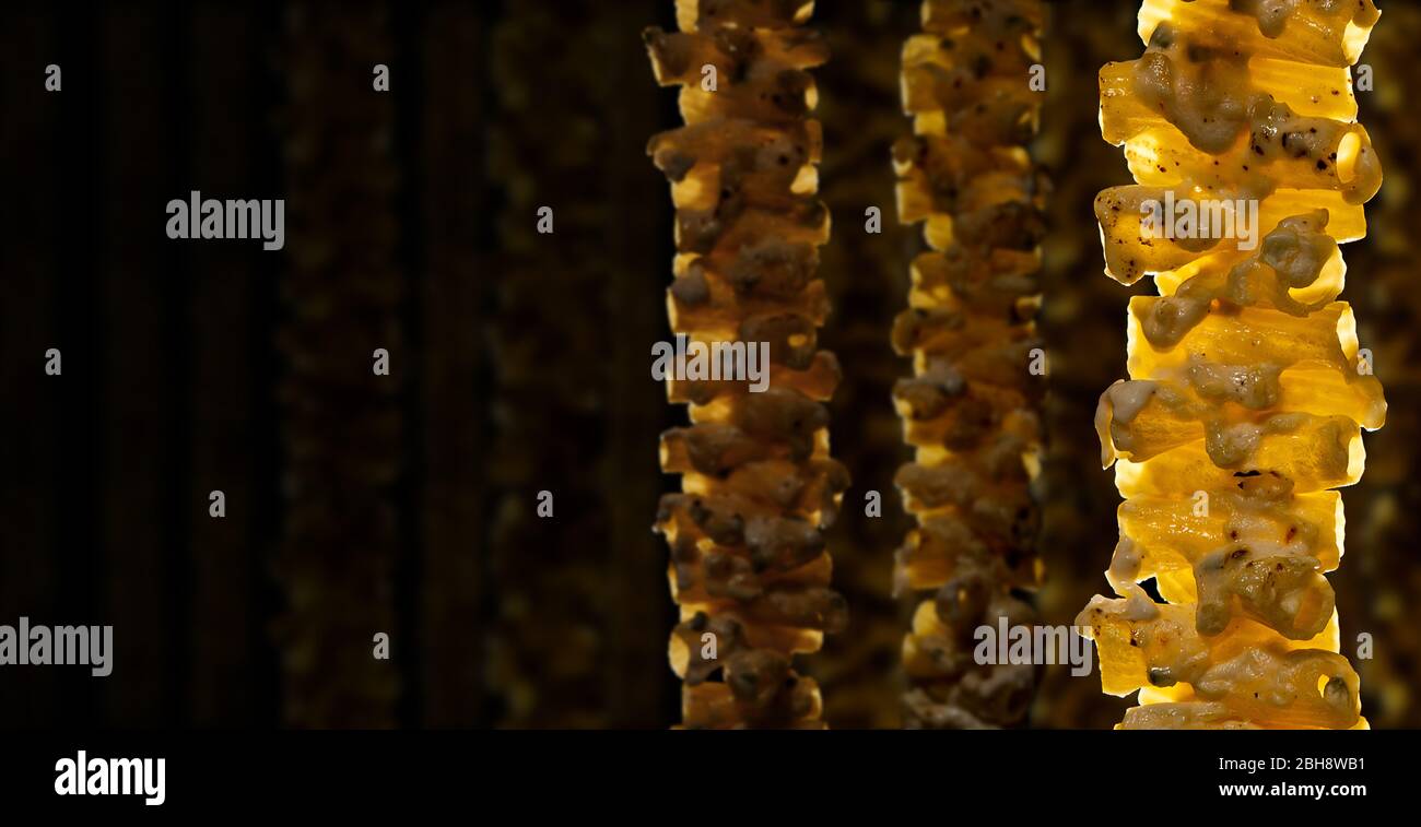 Macaroni and cheese chain link food design Stock Photo - Alamy