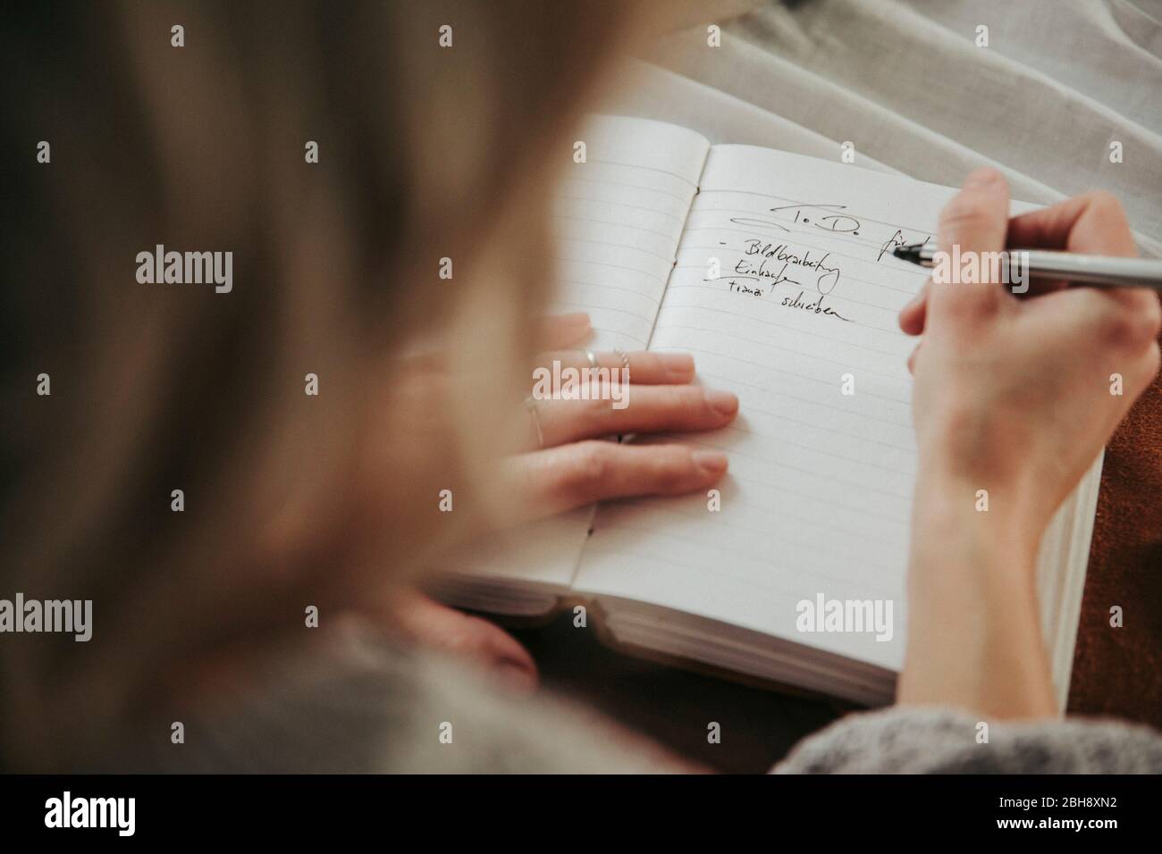 Woman lists hi-res stock photography and images - Alamy