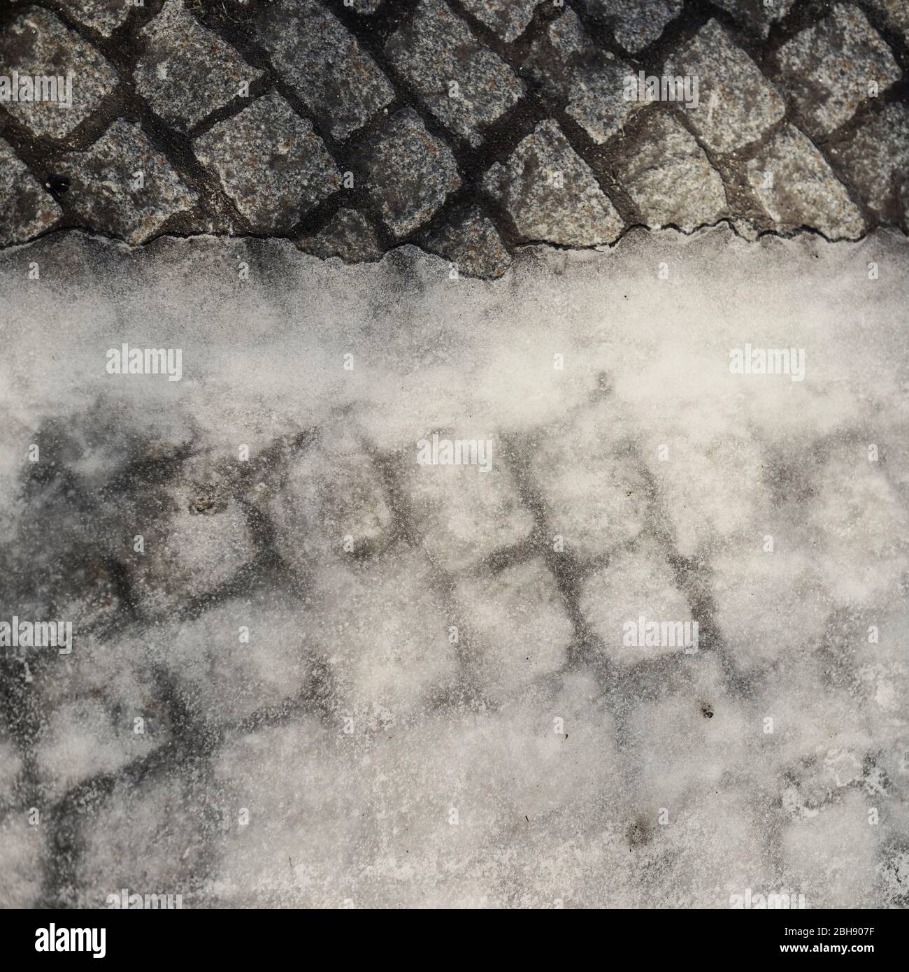 Ice on cobblestones hi-res stock photography and images - Alamy
