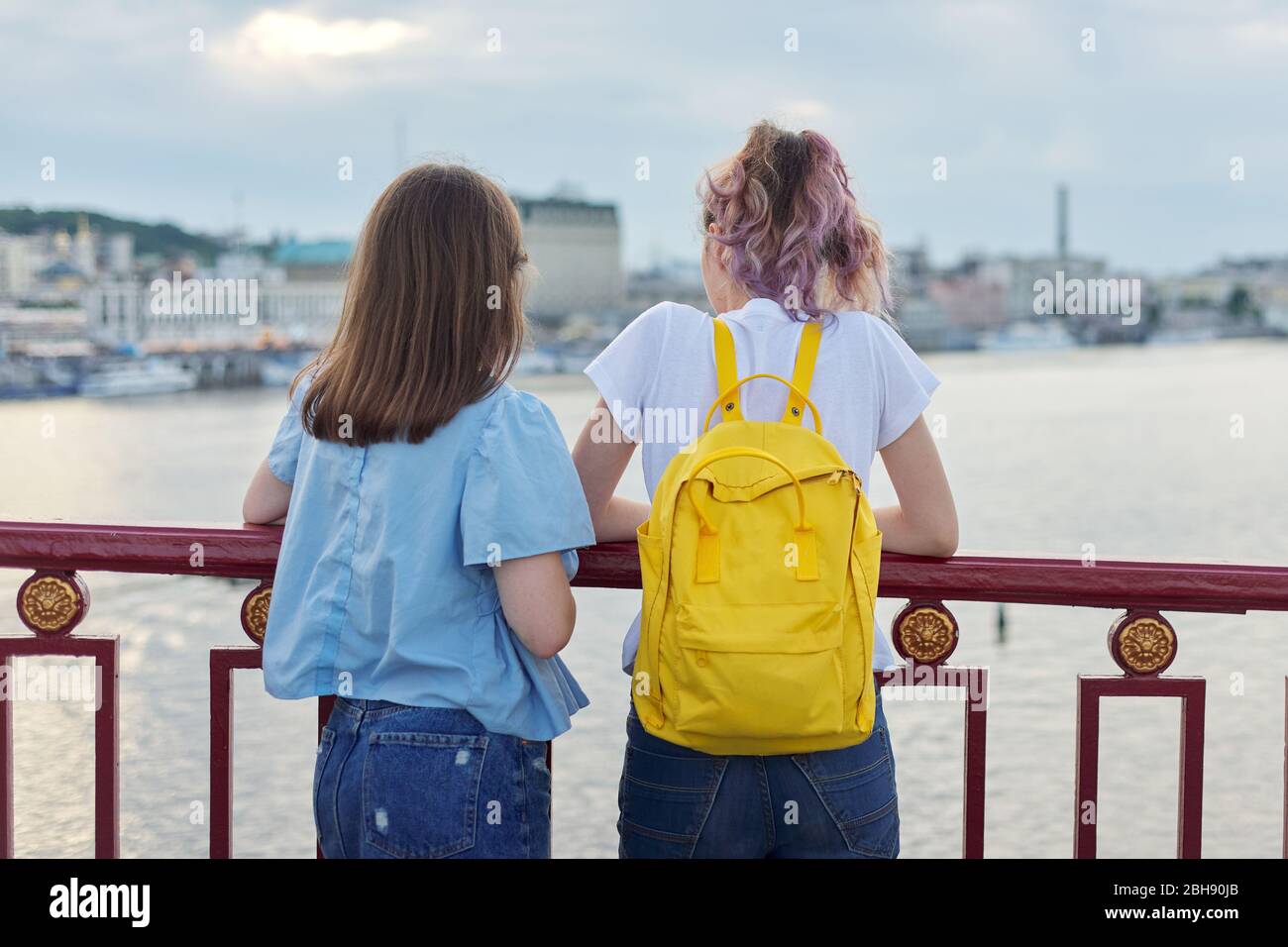 Two friends talking on bridge hi-res stock photography and images - Alamy
