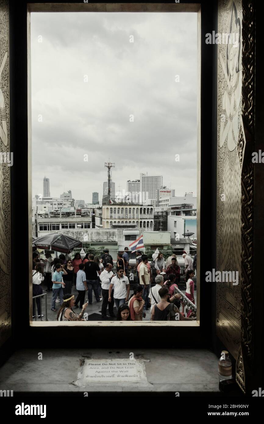 View from the temple of Wat Traimit with visitors Stock Photo - Alamy