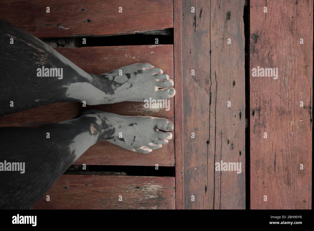 Poo Clone Mud Spa - Boy with mud on the skin Stock Photo - Alamy