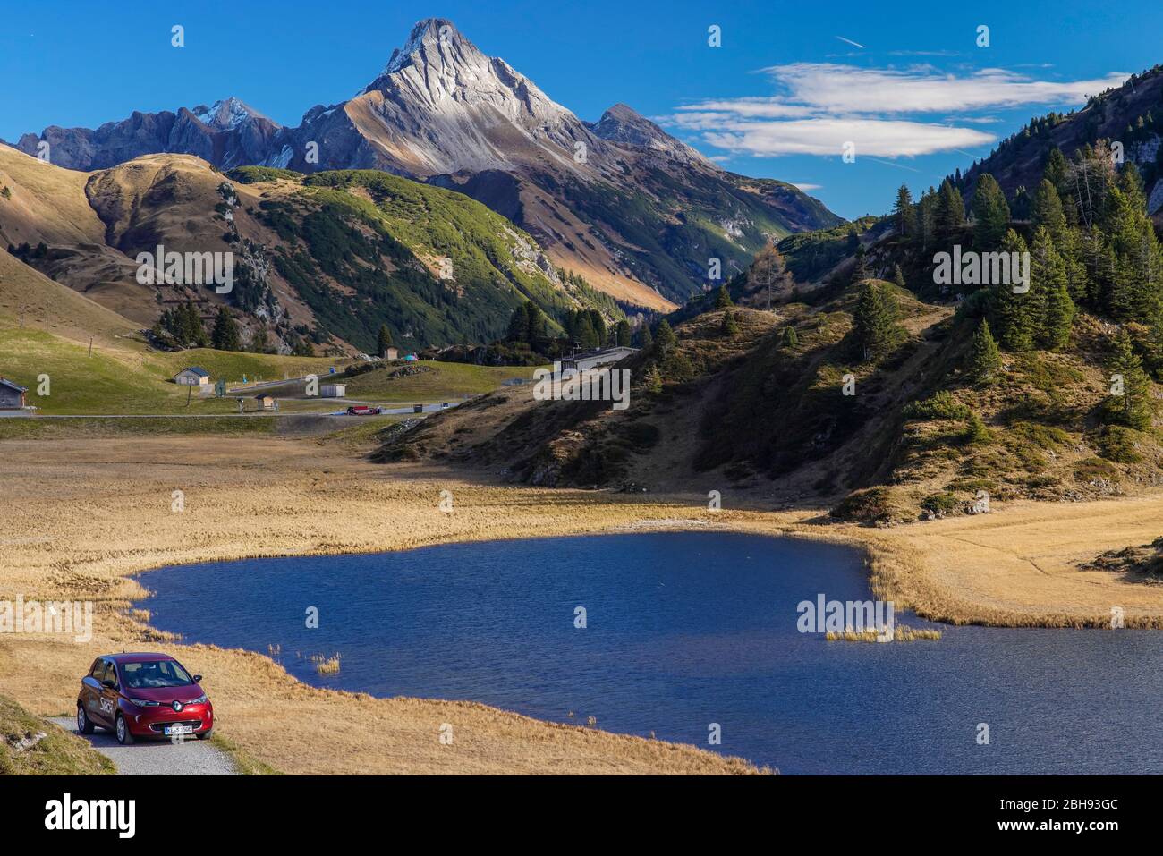 Car on the road in alps hi-res stock photography and images - Alamy