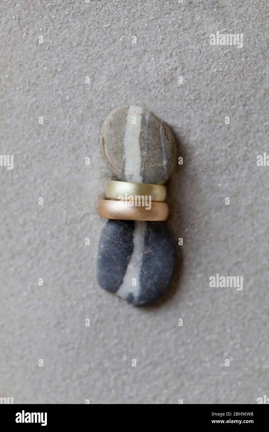 Wedding rings between two stones with continuous line of stones hi-res ...