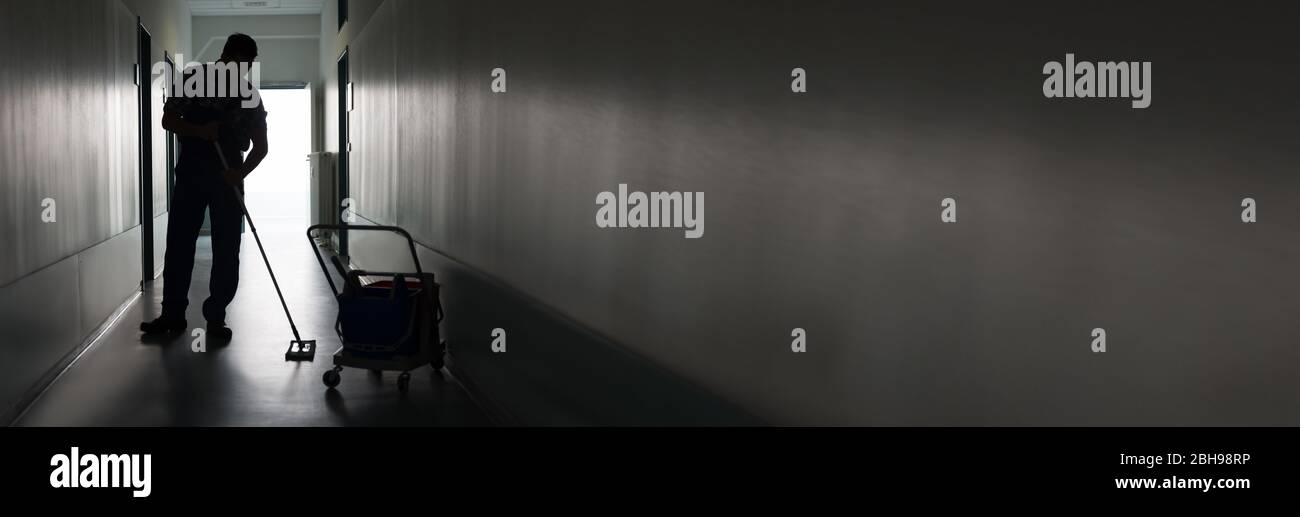 Janitor Worker Cleaning Office. Professional Cleaner Man Stock Photo ...