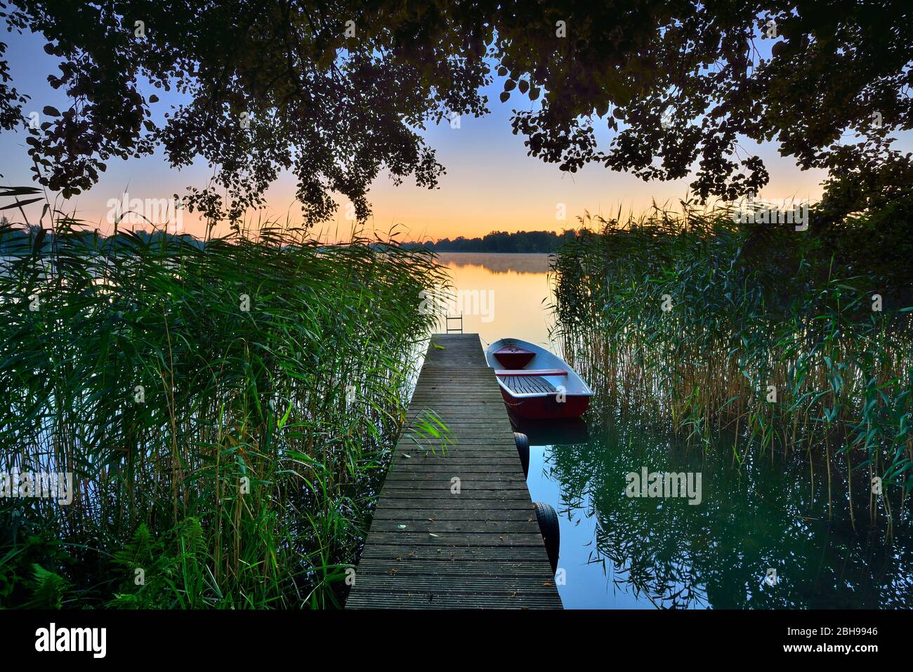 Jetties with rowing boats hi-res stock photography and images - Alamy
