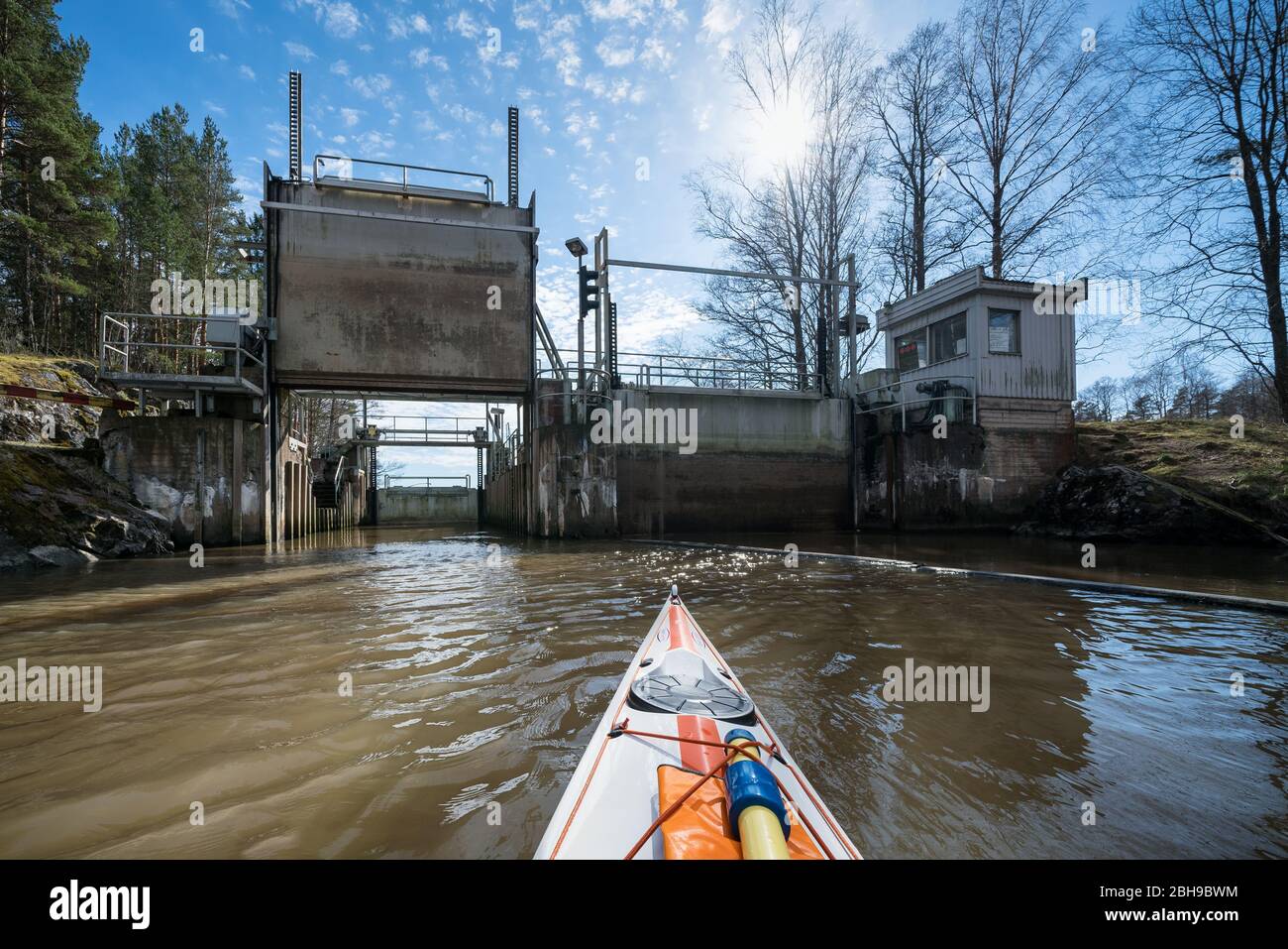Kayaking through a canal sluice gate in Siuntio, Finland Stock Photo ...