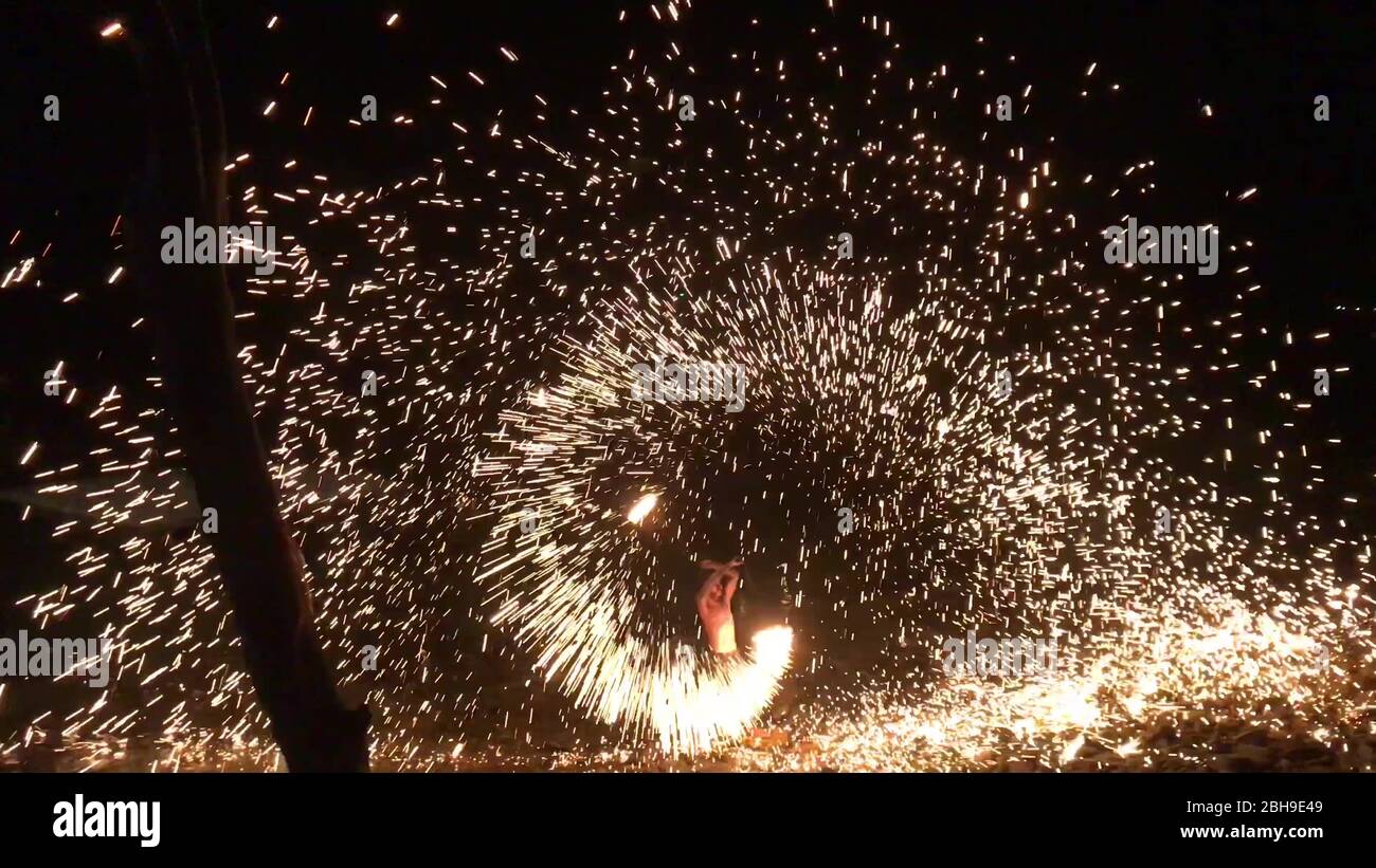KO CHANG, THAILAND - APRIL 14, 2018: Single man fire show at night in a ...