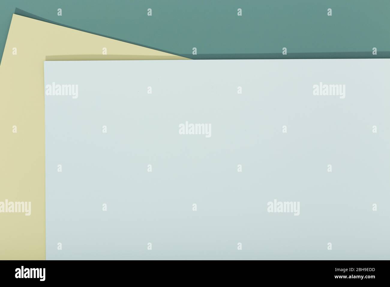 Abstract blue, green and beige color paper geometry composition ...