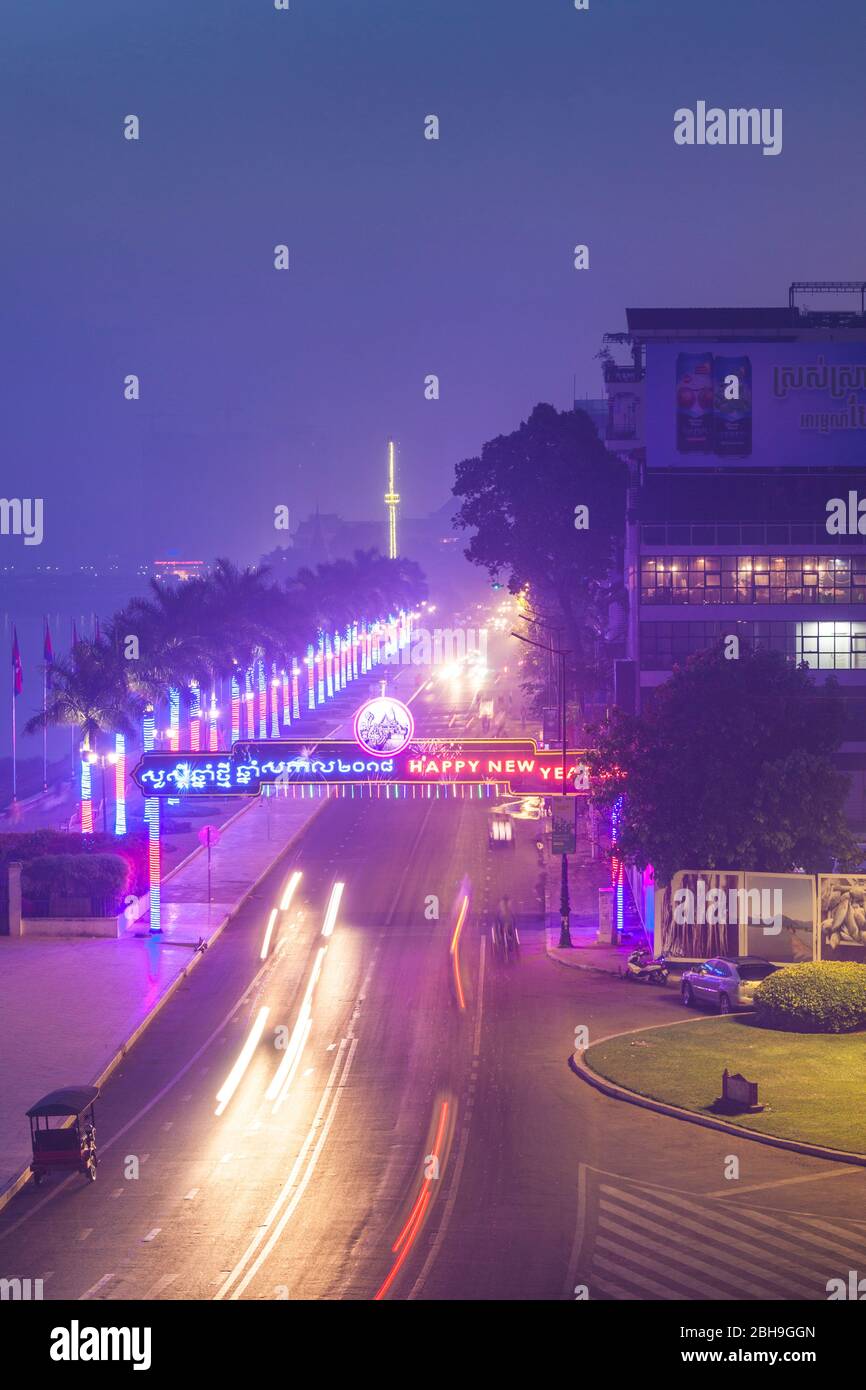 Cambodia, Phnom Penh, Sisowath Quay traffic, elevated view, dawn Stock ...