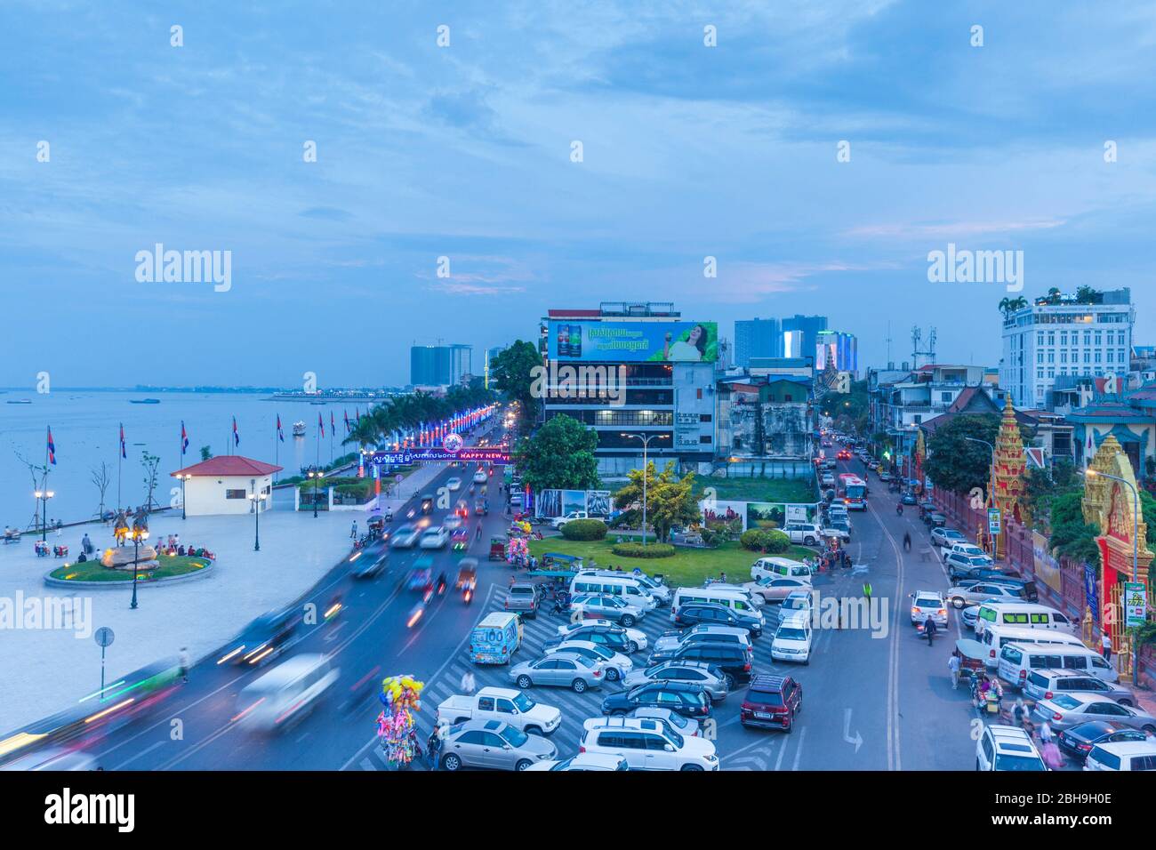 Cambodia, Phnom Penh, Sisowath Quay traffic, elevated view, dusk Stock ...