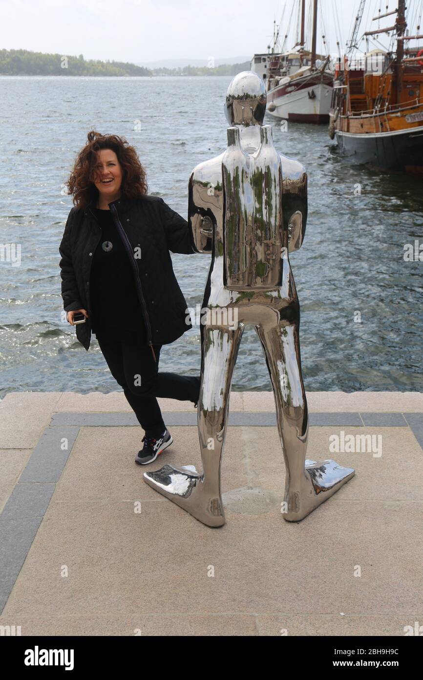 Ola Enstad's Dykkaren statue of silver scuba diver, Oslo Harbour Stock ...