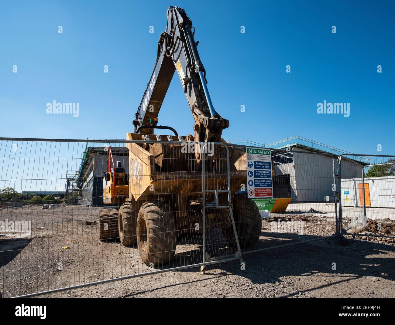 Construction vehicles at a new engineering production factory being ...