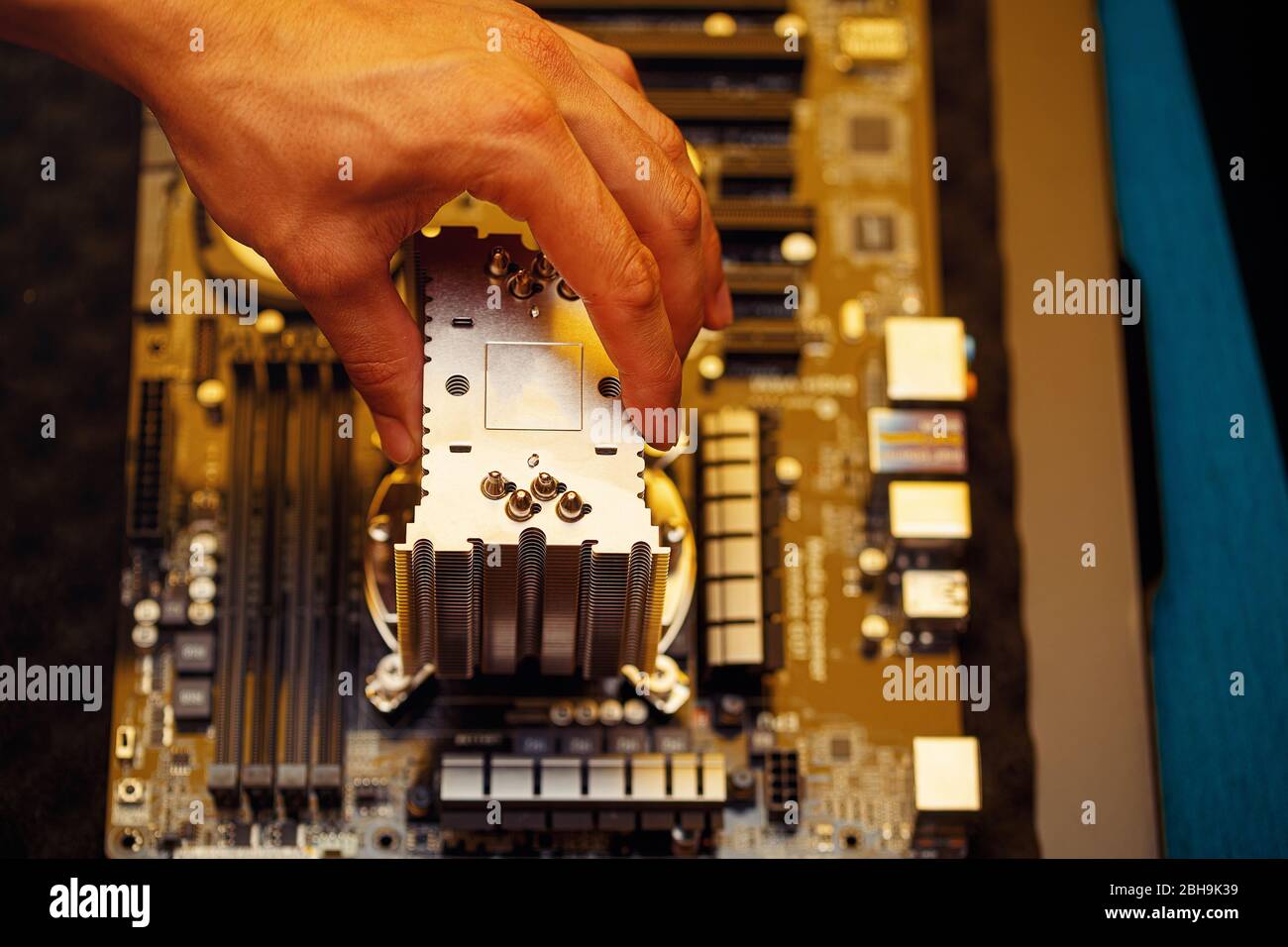 Repairman repairs the computer, Removing the computer motherboard Stock ...