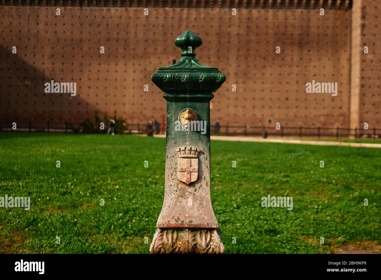 Ancient drinking water fountain in historical touristic center in ...