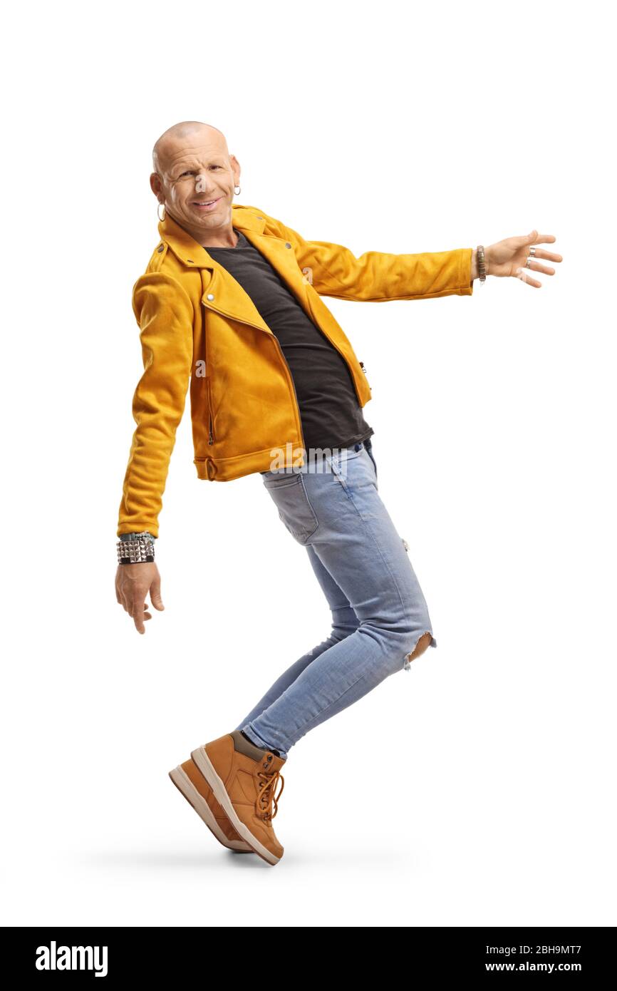Full length shot of a smiling man dancing isolated on white background ...
