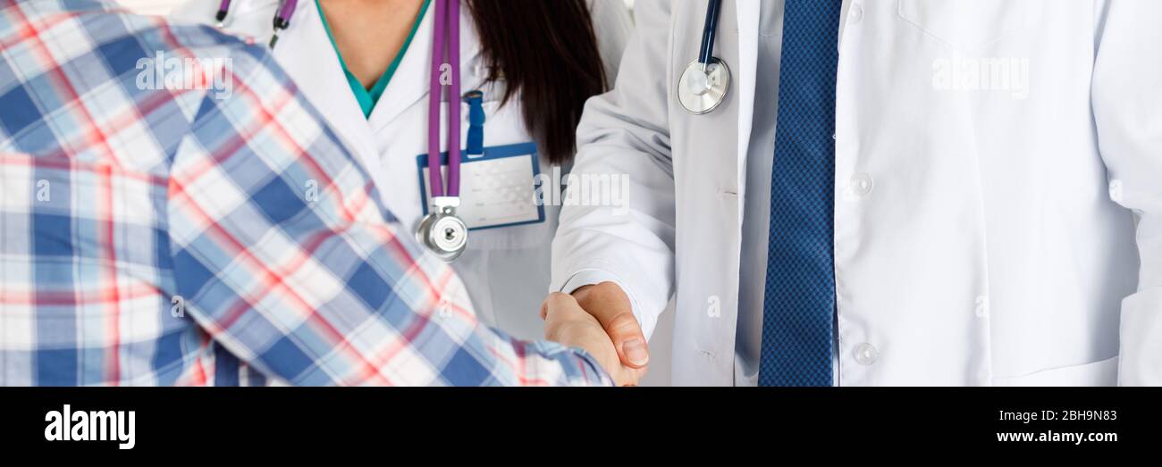 Handclasp hi-res stock photography and images - Alamy