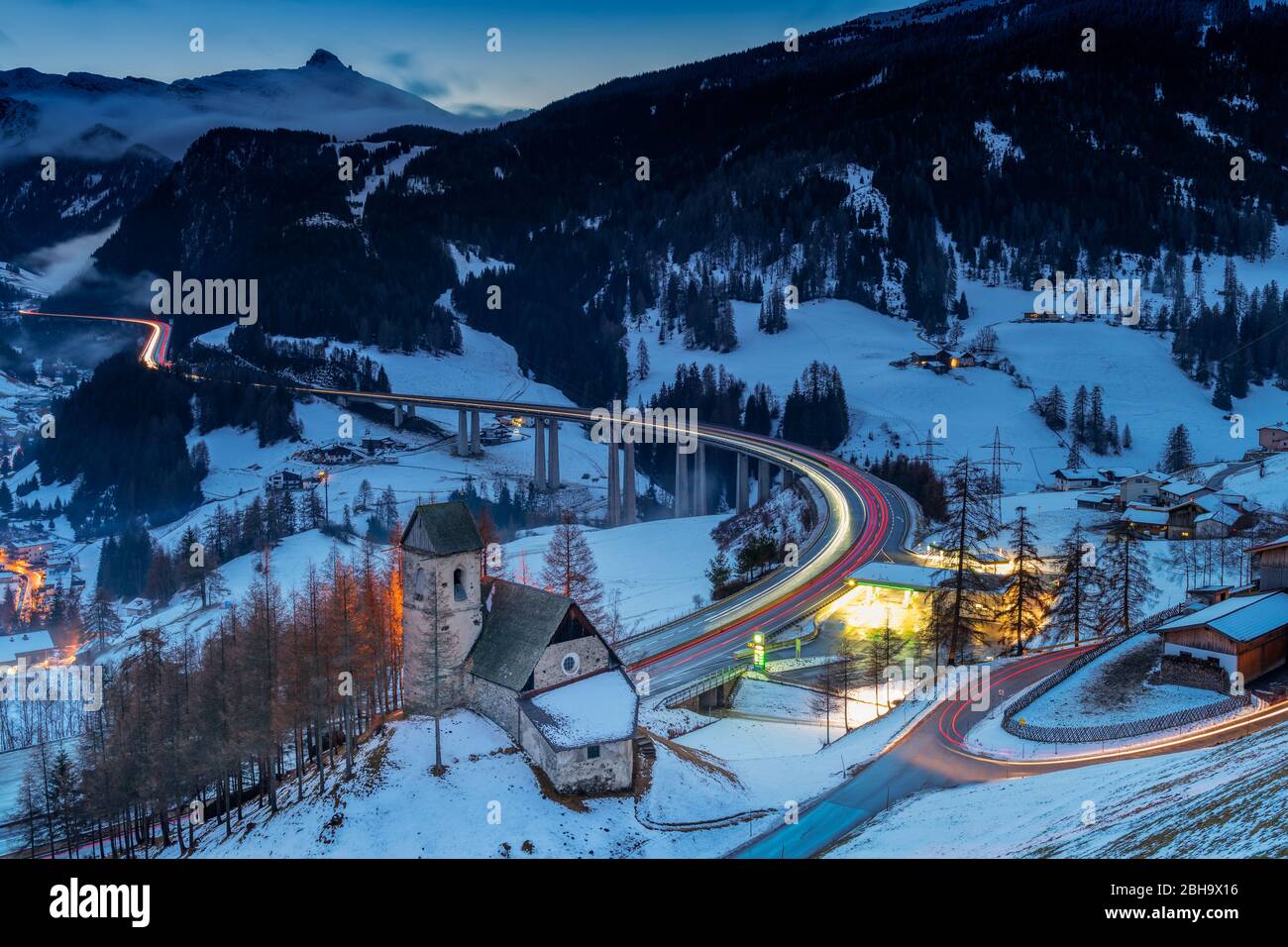Brenner motorway and church St. Jakob in Nösslach at sunrise, community ...
