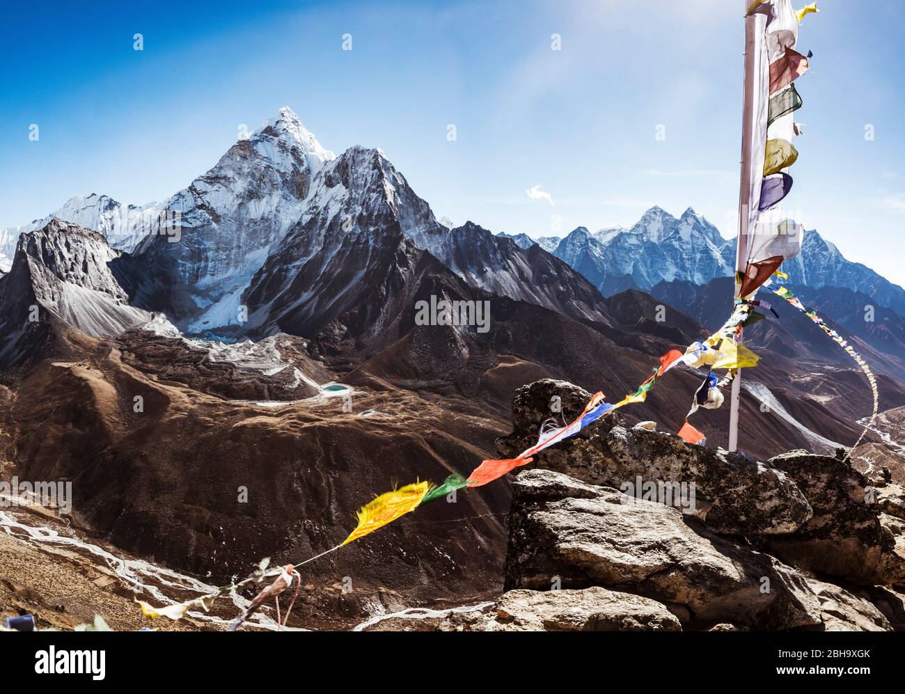 Prayer flags in the background Ama Dablam Stock Photo - Alamy
