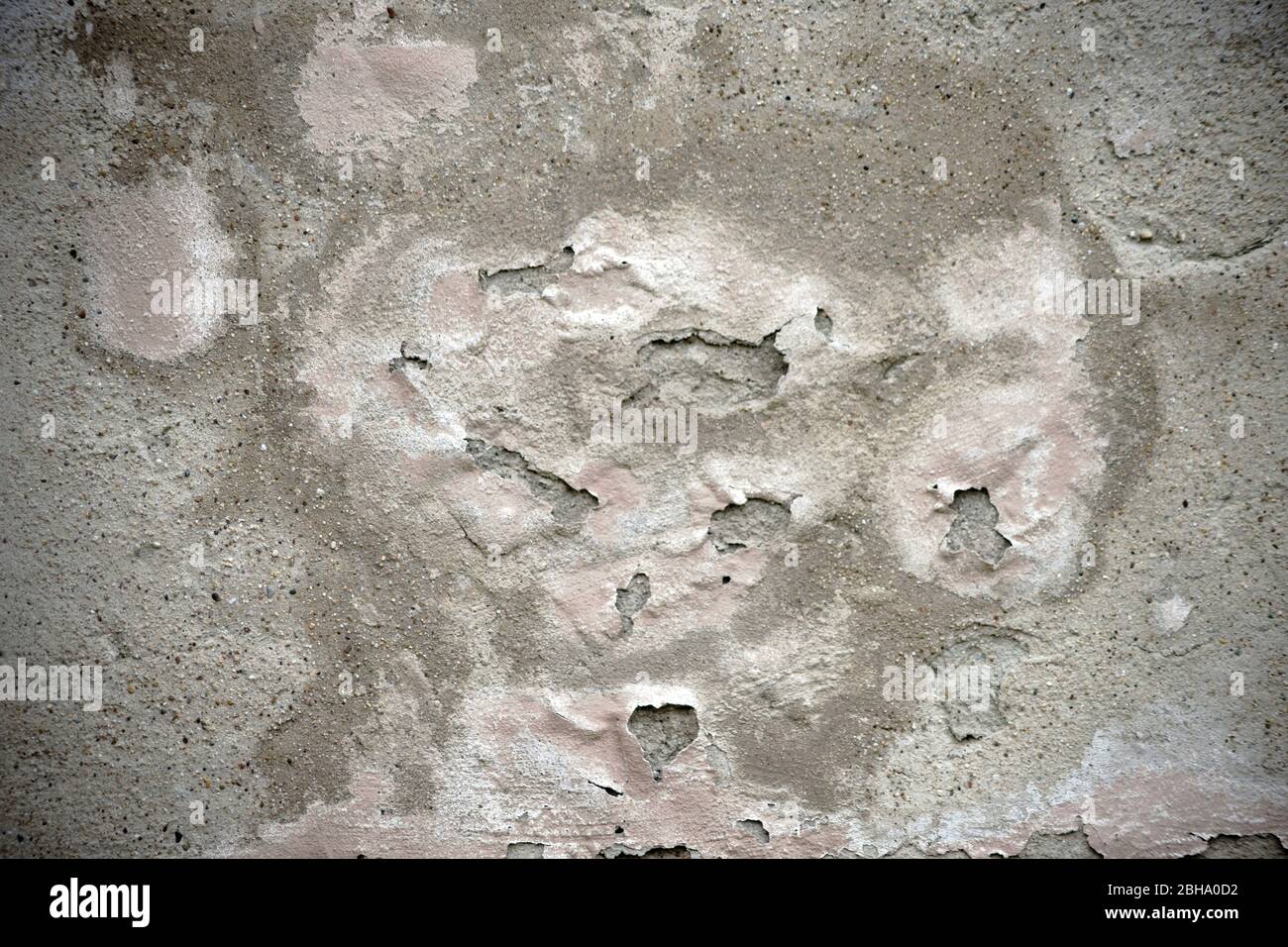 Close up of a wall with a chipped plaster layer hi-res stock ...