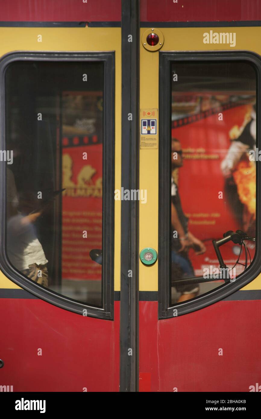 The side view on the body of a passenger train with blurred outlines of ...
