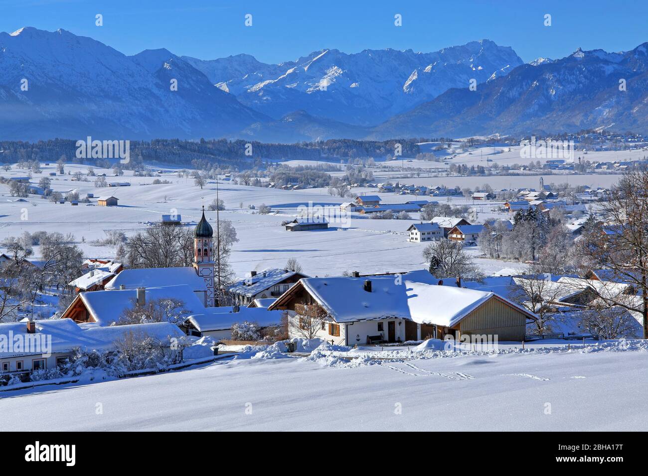 View of the village with a view to lake Riegsee, to Mount Zugspitze and ...