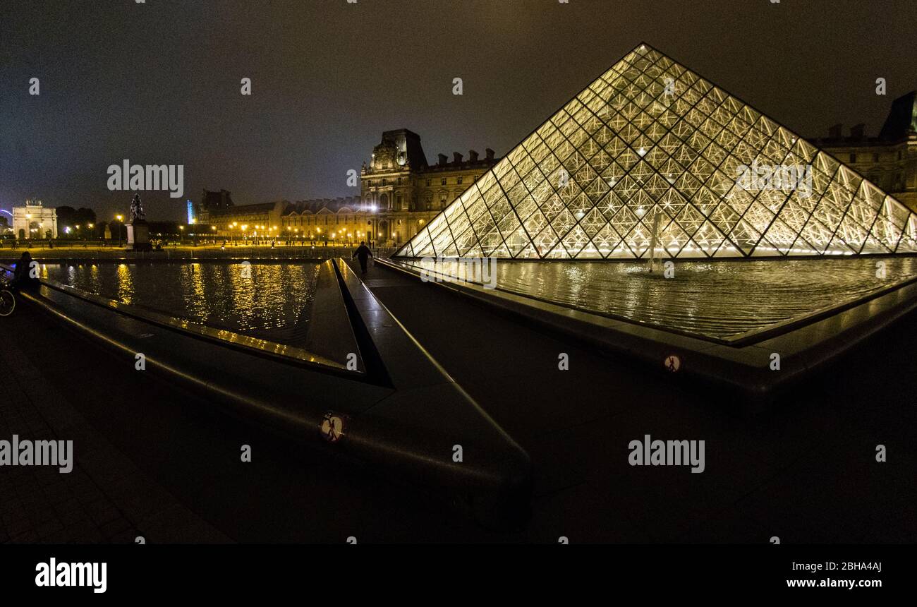 Illuminated Louvre Museum at night, Paris, France Stock Photo - Alamy