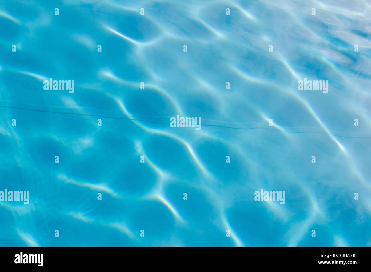 Blue water in swimming pool Stock Photo - Alamy
