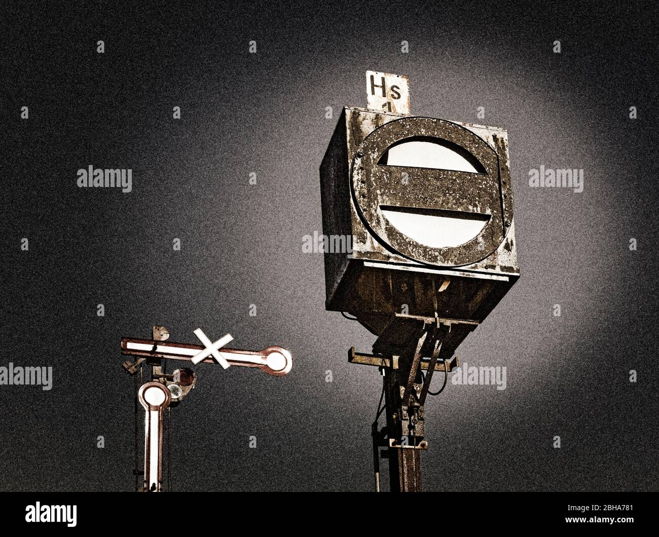 Signals, out of service, tracks, platforms, grass, bushes, scrub, wild ...