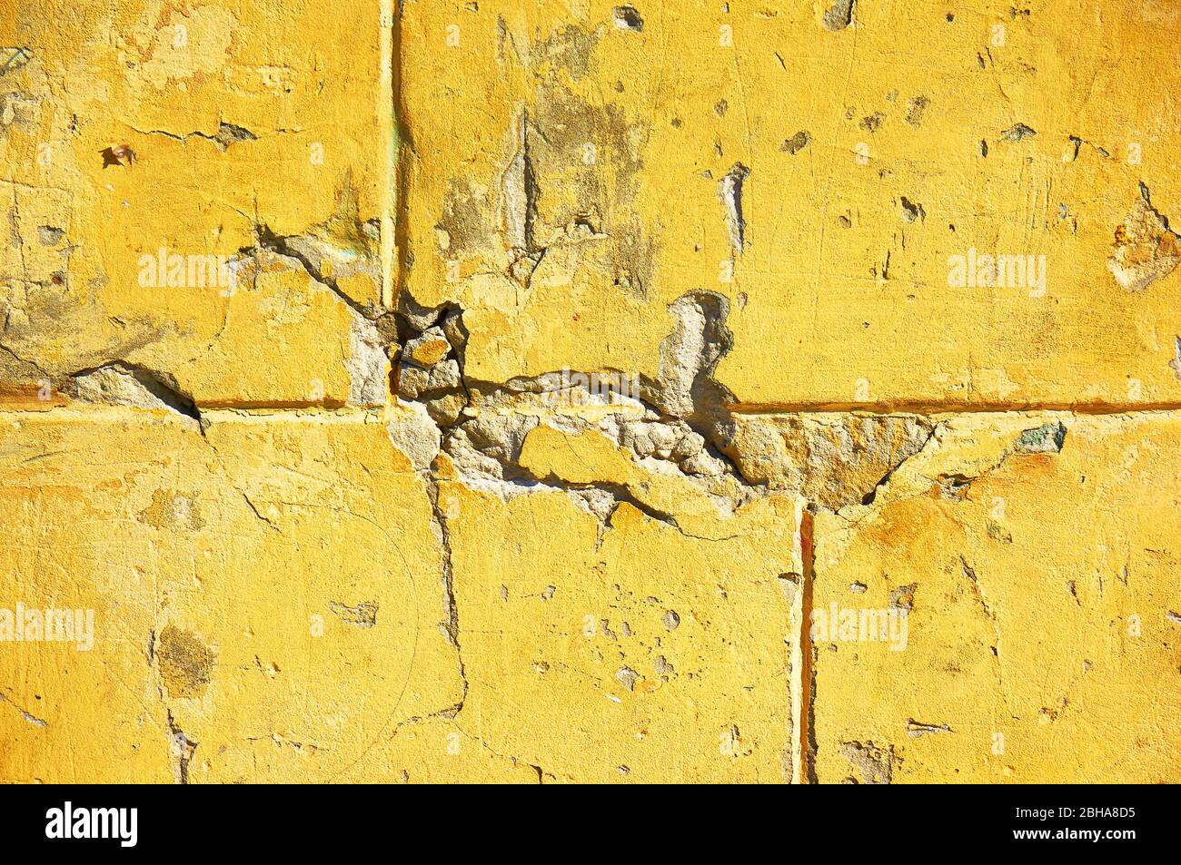 Yellow wall with scratches and chips. Abstract background Stock Photo ...