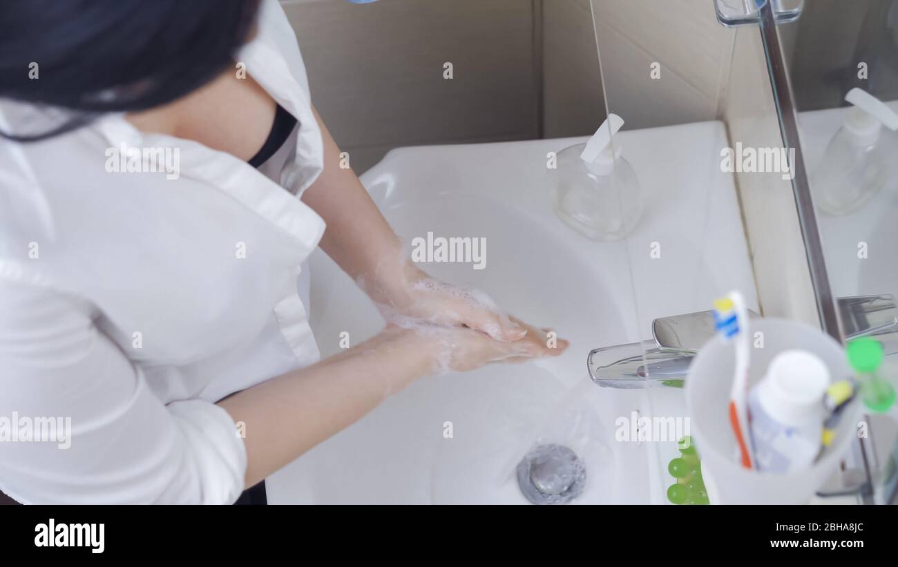 Preventive Wash After Back From Shopping Stock Photo - Alamy