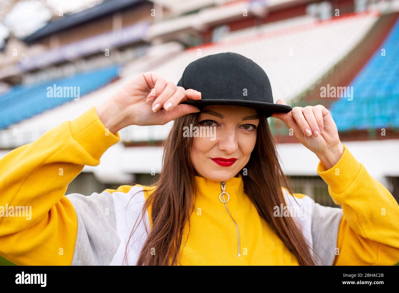 Girl baseball cap smiling hi-res stock photography and images - Alamy
