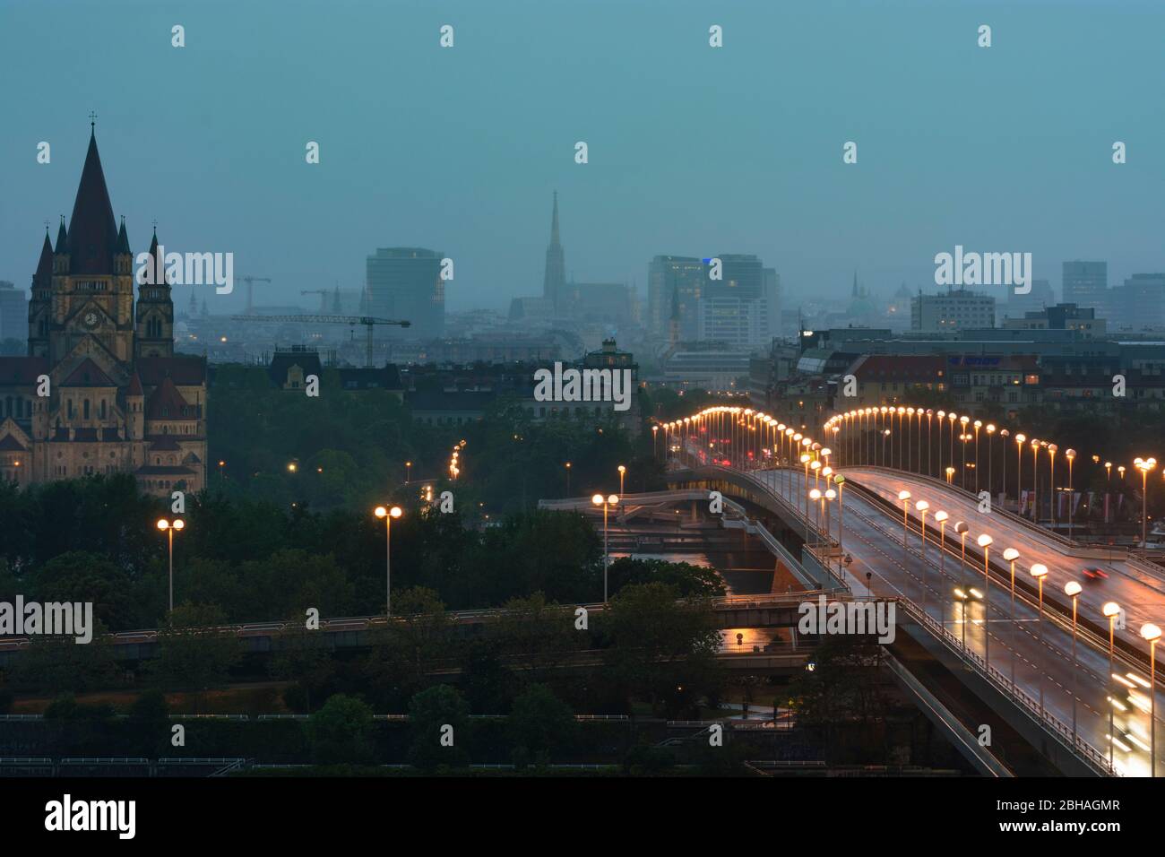 Wien, Vienna: rain rainy, bridge Reichsbrücke, city center, cathedral ...