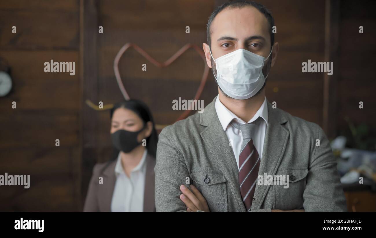 Serious Middle Eastern Business Man In Protective Mask Stock Photo - Alamy