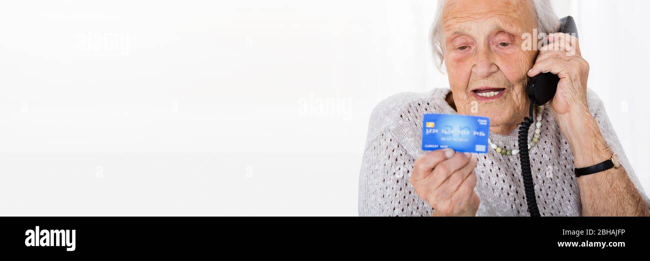 Elder Woman Phone Call Credit Card Scam Stock Photo - Alamy