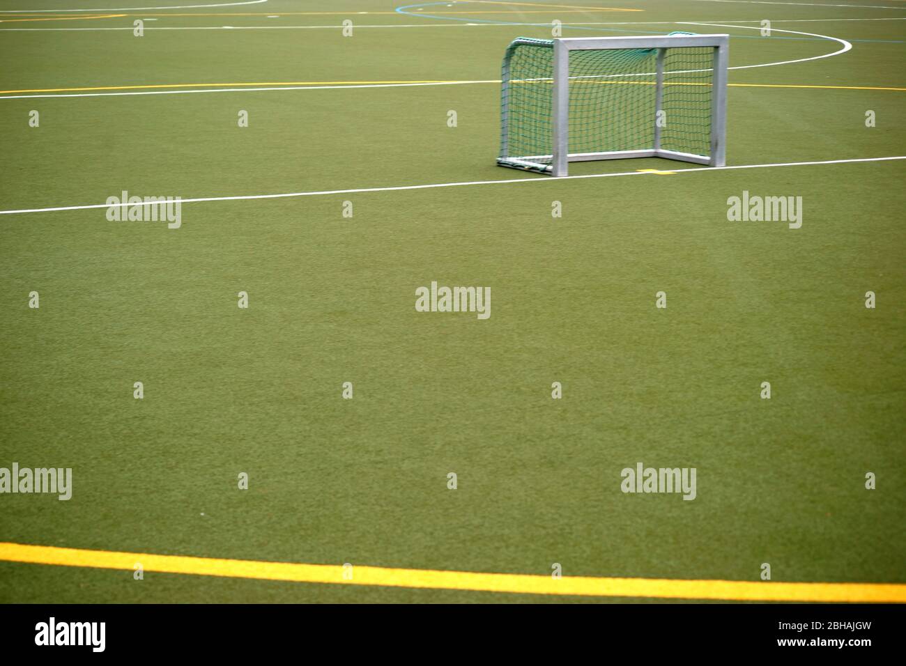 The close-up of an artificial turf field for football matches and field ...