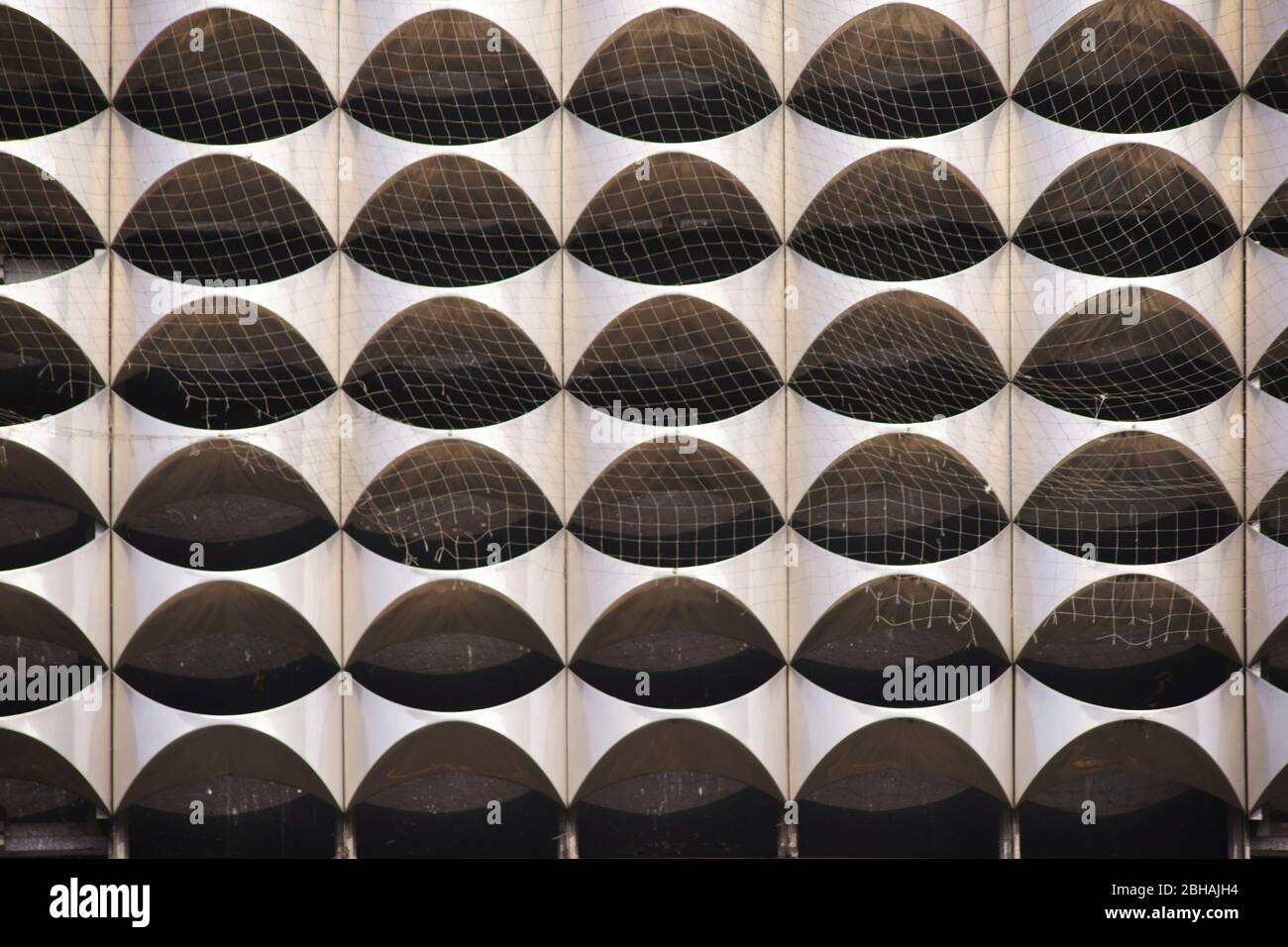 A modern and elegant façade cladding of a stainless steel business ...