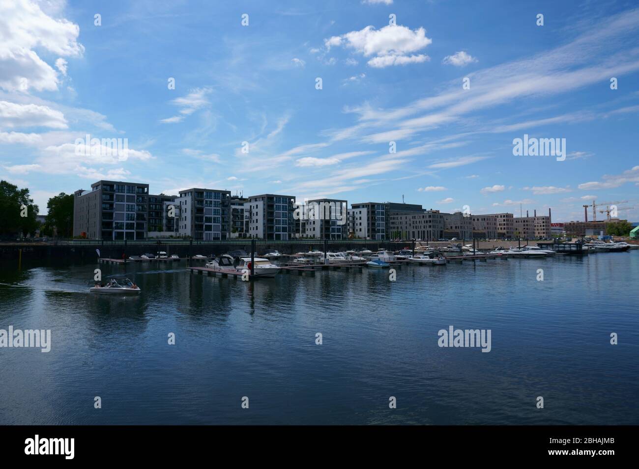 A marina and inland port at the customs harbor in Mainz with newly ...