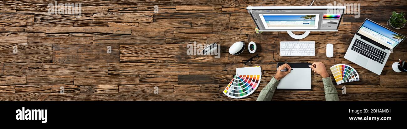 Photo Designer Editing Web Page On Computer Stock Photo - Alamy