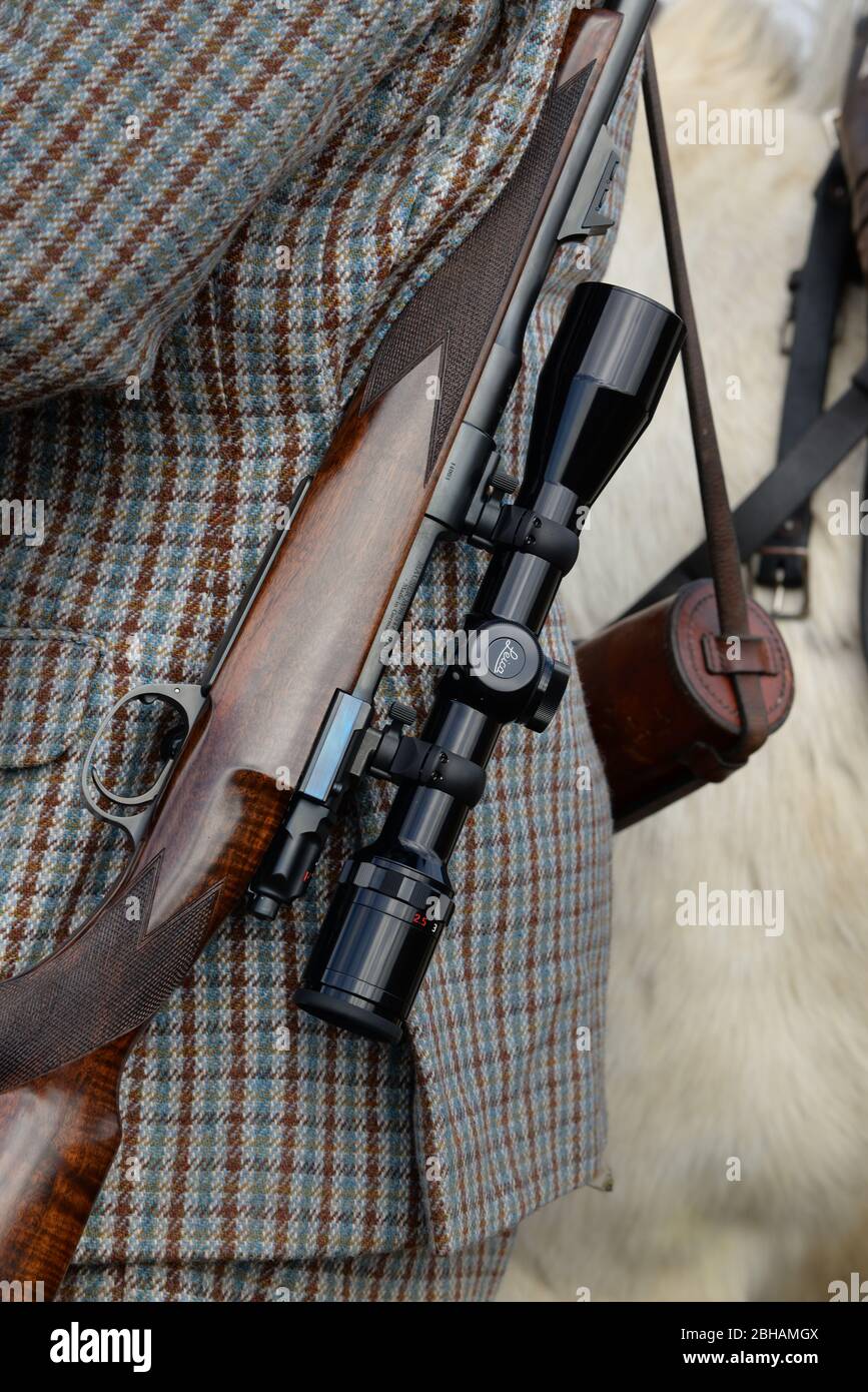 Atholl Estate Gamekeeper with a Rigby rifle with telescopic sight Stock ...