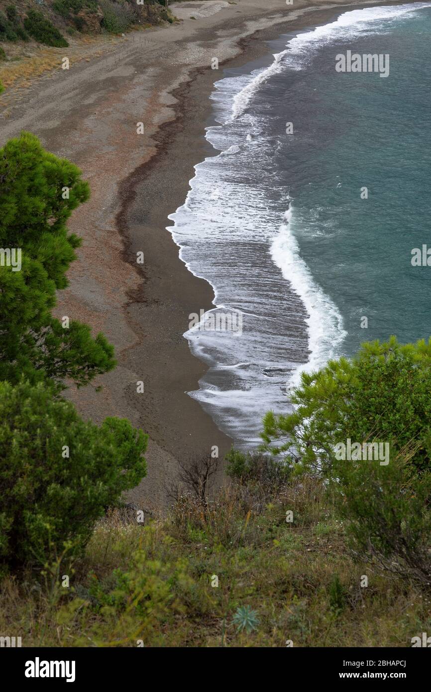View of the beach platja de garbet at colera hi-res stock photography ...
